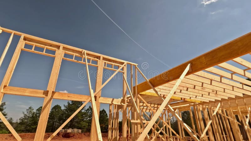 The Construction of a Stick House Involves Assembling Timber Beams into ...