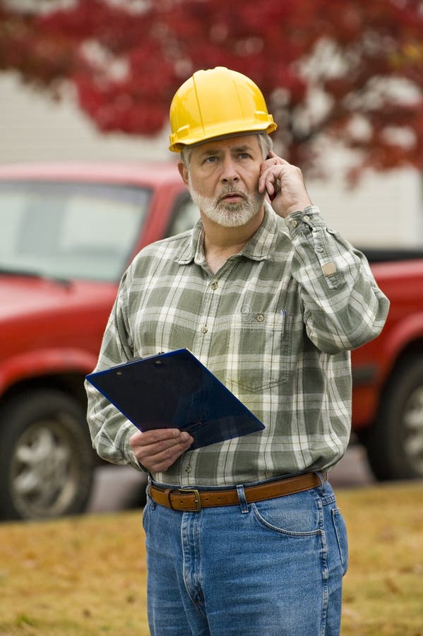 Construction Supervisor Makes Phone Call Stock Photo - Image of casual ...