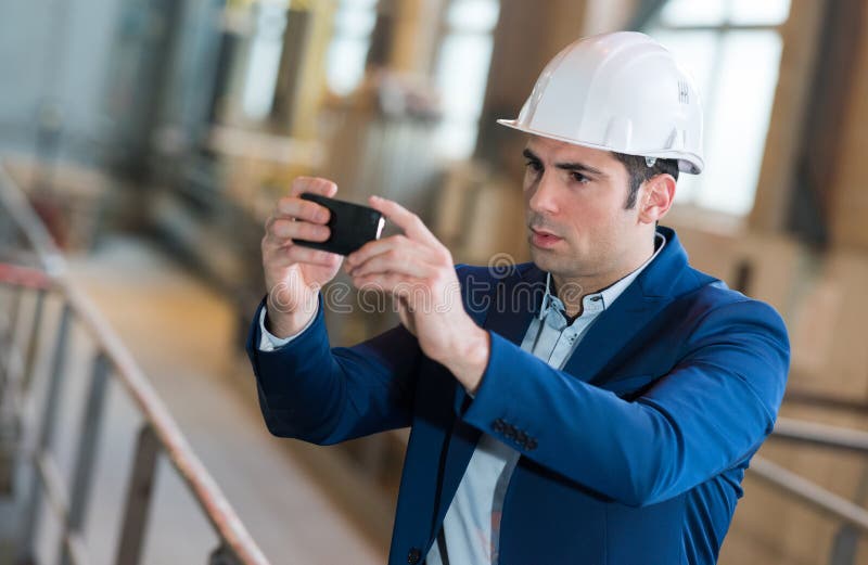 Construction Supervisor Making Phone Photos Stock Photo - Image of ...