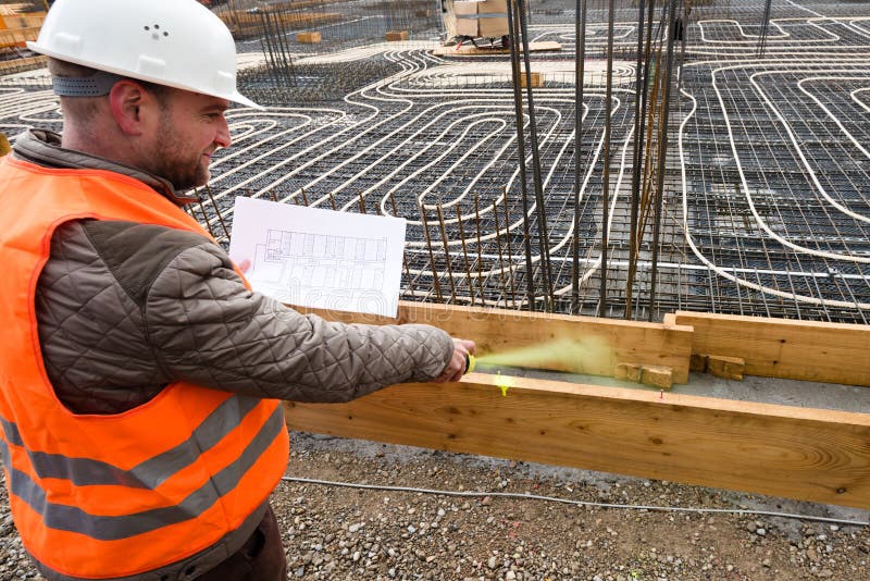 Construction Supervisor with Plan Marking the Site Stock Photo - Image ... Construction Supervisor with Plan Marking the Site Stock Photo - Image ...