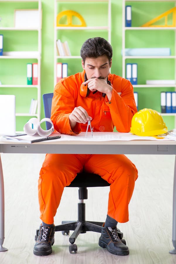 The Construction Supervisor Planning New Project in Office Stock Image ...