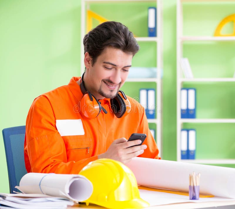 Construction Supervisor Planning New Project in Office Stock Photo ...