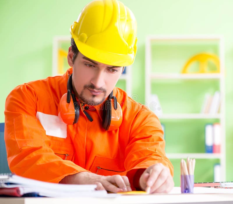 Construction Supervisor Planning New Project in Office Stock Image ...