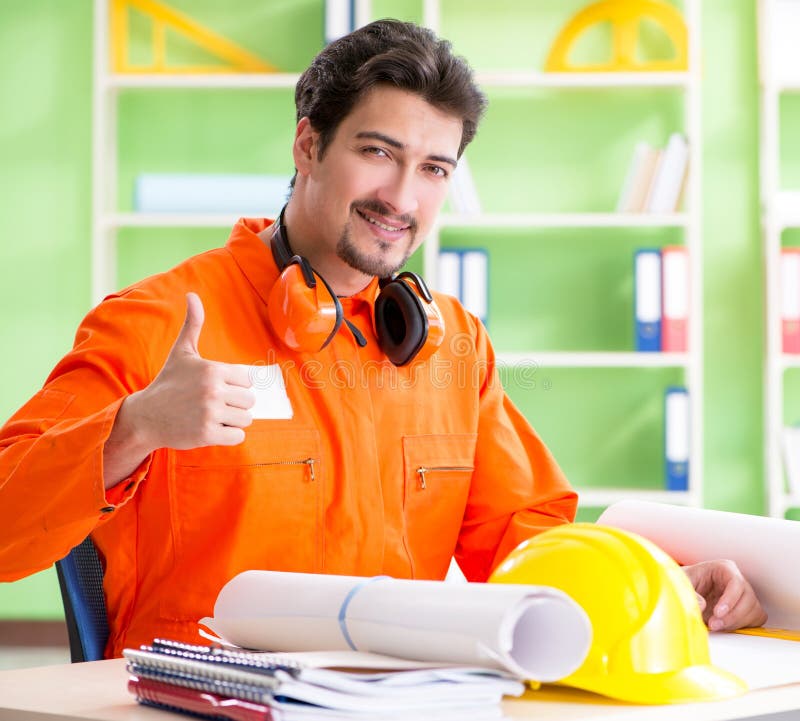 Construction Supervisor Planning New Project in Office Stock Image ...