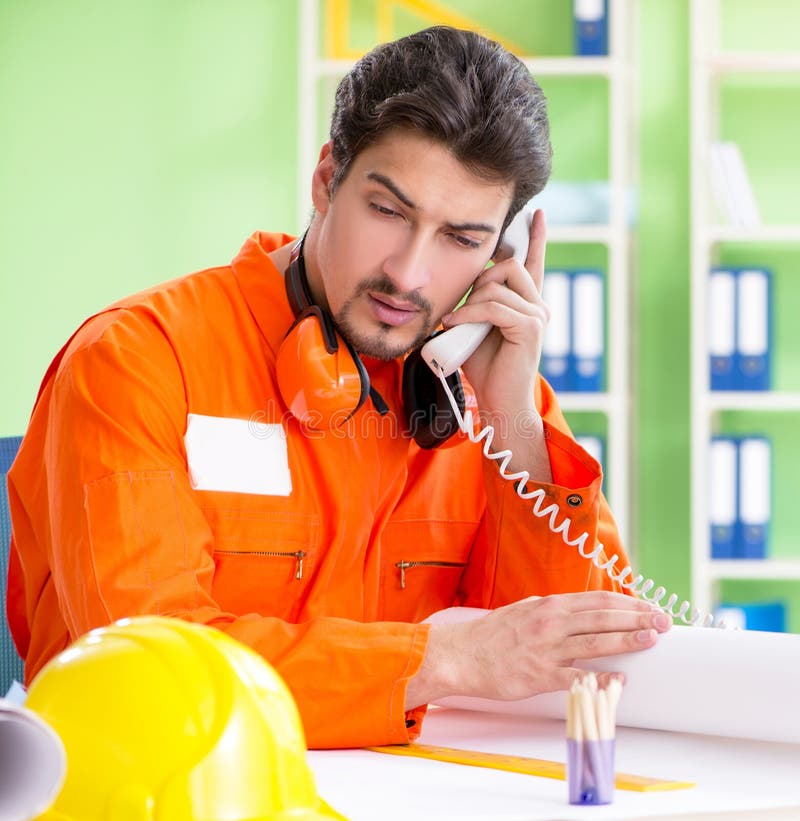 Construction Supervisor Planning New Project in Office Stock Image ...