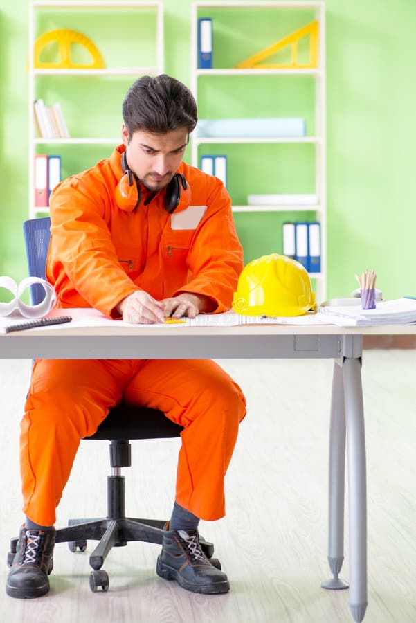 The Construction Supervisor Planning New Project in Office Stock Image ...