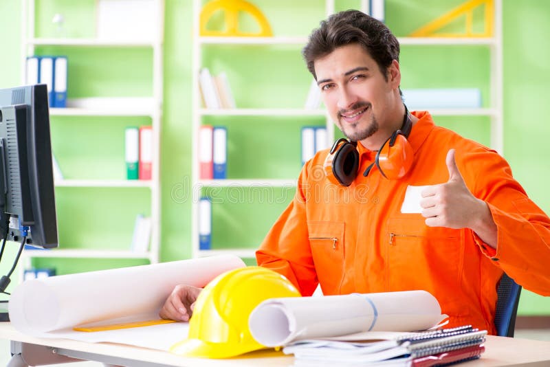 The Construction Supervisor Planning New Project in Office Stock Image ...