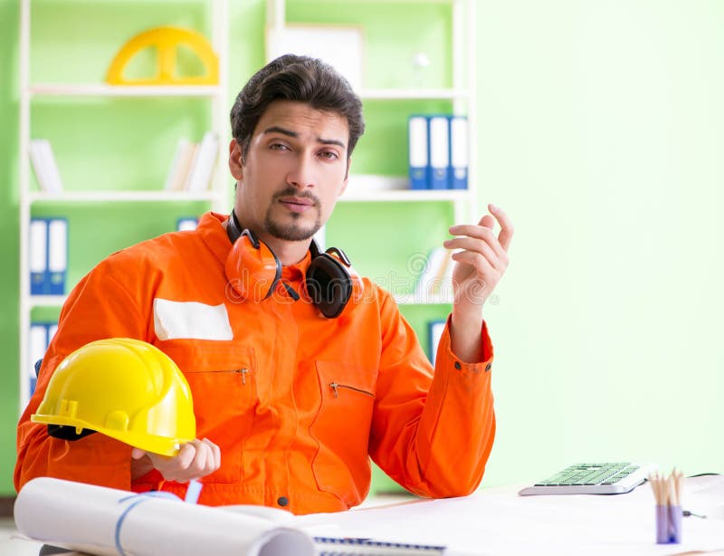 Construction Supervisor Planning New Project in Office Stock Photo ...