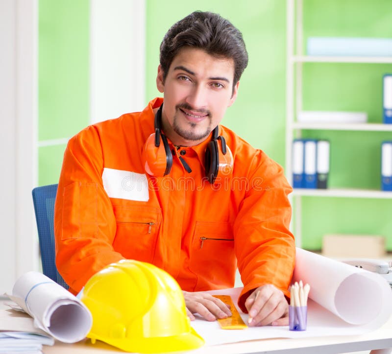 Construction Supervisor Planning New Project in Office Stock Photo ...