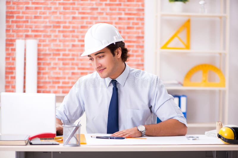 The Construction Supervisor Working on Blueprints Stock Photo - Image ...