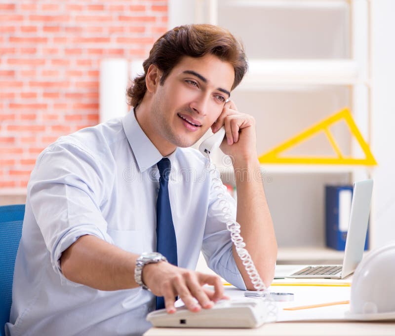 Construction Supervisor Working on Blueprints Stock Photo - Image of ...