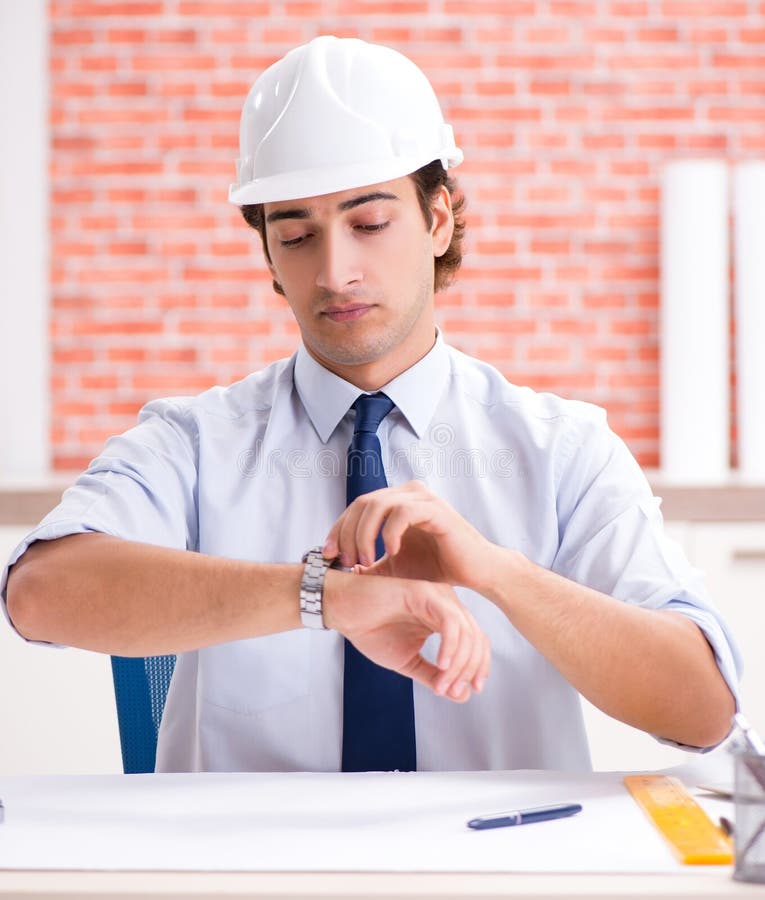 Construction Supervisor Working on Blueprints Stock Photo - Image of ...