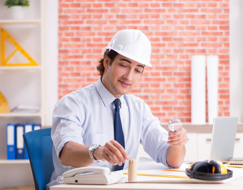 Construction Supervisor Working on Blueprints Stock Image - Image of freelance, draft: 293314913
