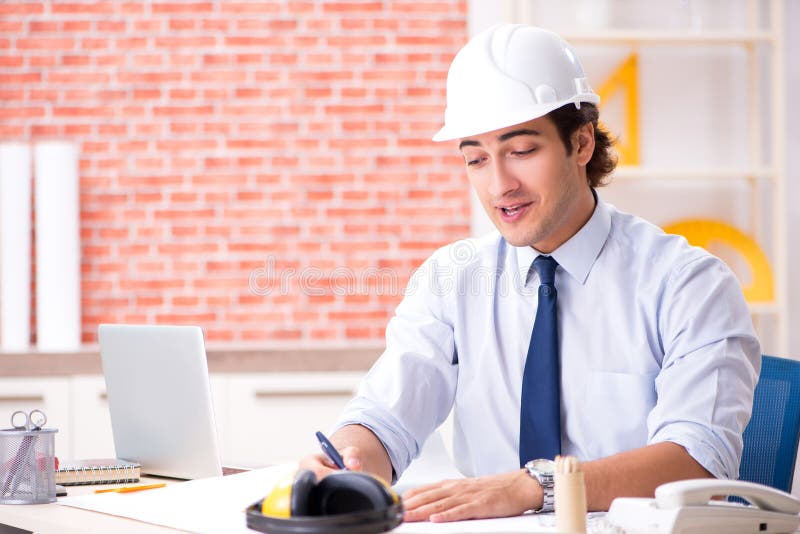 The Construction Supervisor Working on Blueprints Stock Photo - Image ...