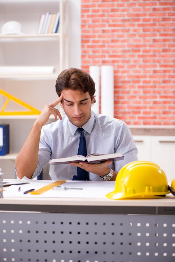 The Construction Supervisor Working on Blueprints Stock Image - Image ...