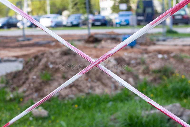 Construction Tape Cross at a Construction Site Stock Image - Image of ...