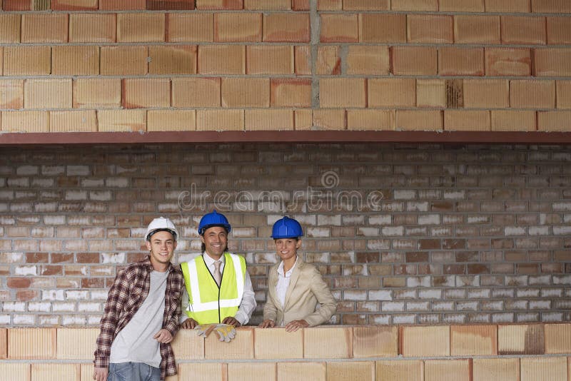 Construction Team at Building Site Stock Photo - Image of building ...