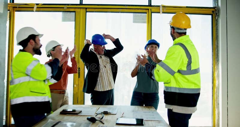 Construction, Team and Celebration with Blueprint, Teamwork and ...