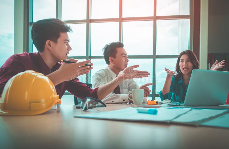 Construction Team Engineer Architect is Brainstorming on Working Table ...