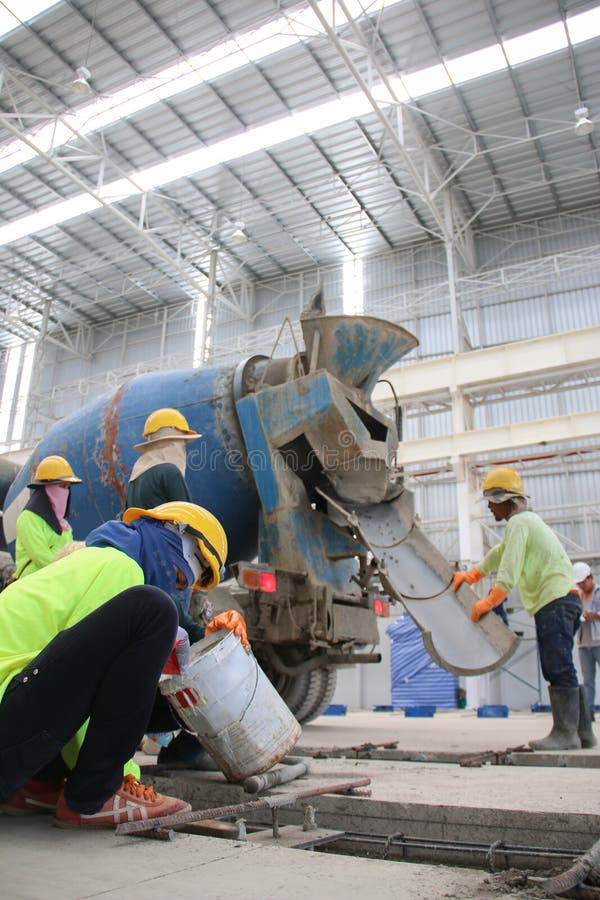 Construction Teamwork in Factory Editorial Photography - Image of ...