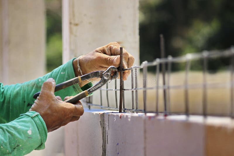 Construction Technicians are Building Brick Walls with Lightweight ...