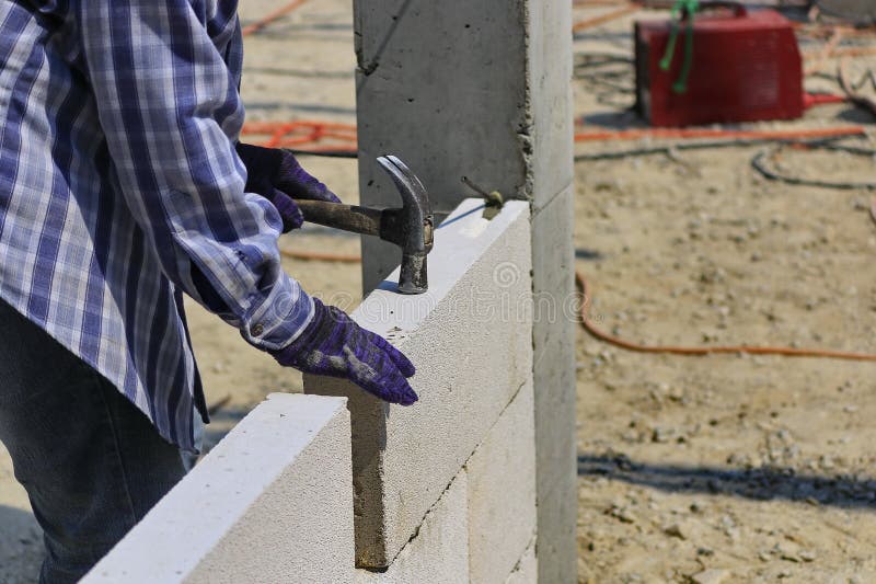 Construction Technicians are Building Brick Walls with Lightweight ...
