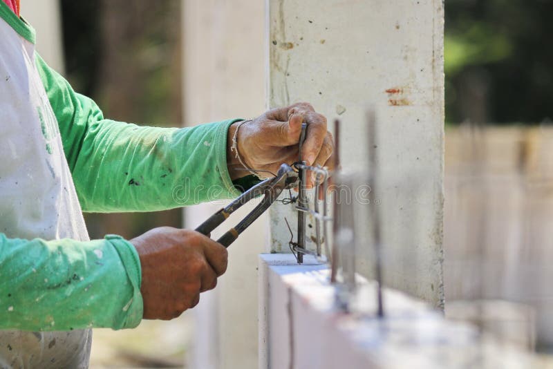 Construction Technicians are Building Brick Walls with Lightweight ...