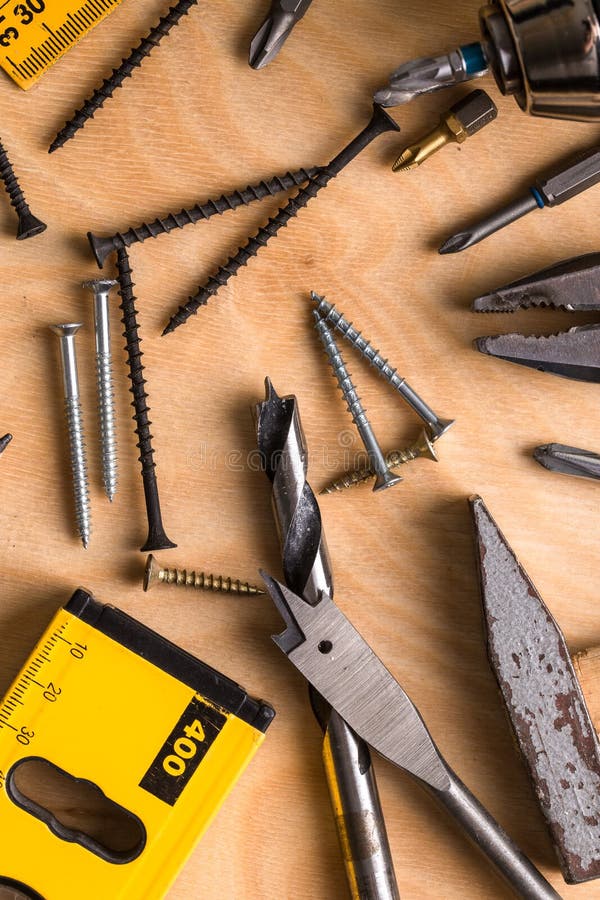 Construction Theme. Working Tool on a Wooden Background Stock Image ...