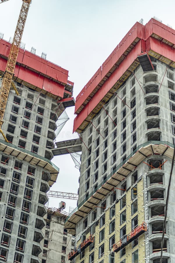 Construction of Three High-rise Buildings Using Cranes. Stock Image ...
