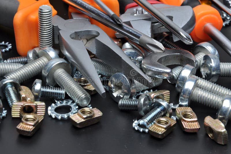 Construction Tools and Bolts Stock Image - Image of silver ...