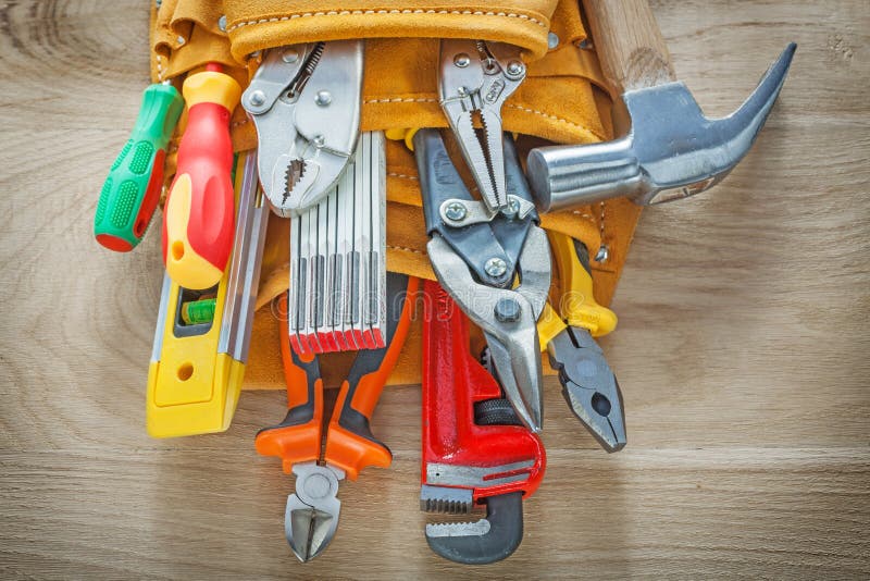 Construction Tools in Building Belt on Wood Board Stock Photo - Image ...