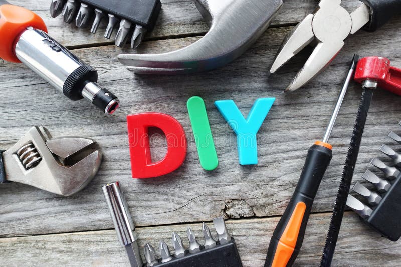Construction Tools and DIY Letters Suggesting Do it Yourself Concept ...