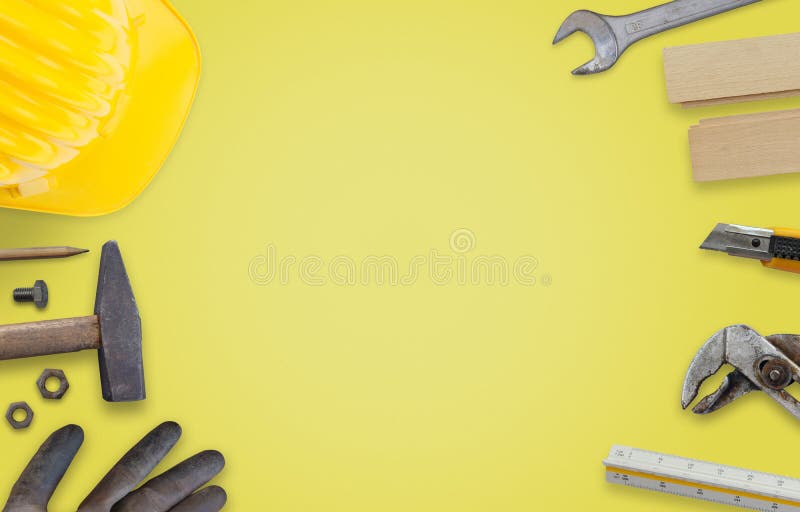 Construction Tools with Free Space for Text on Yellow Desk Stock Photo ...