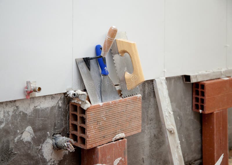 Construction Spatula Trowel in Tile Work Stock Photo - Image of hand ...