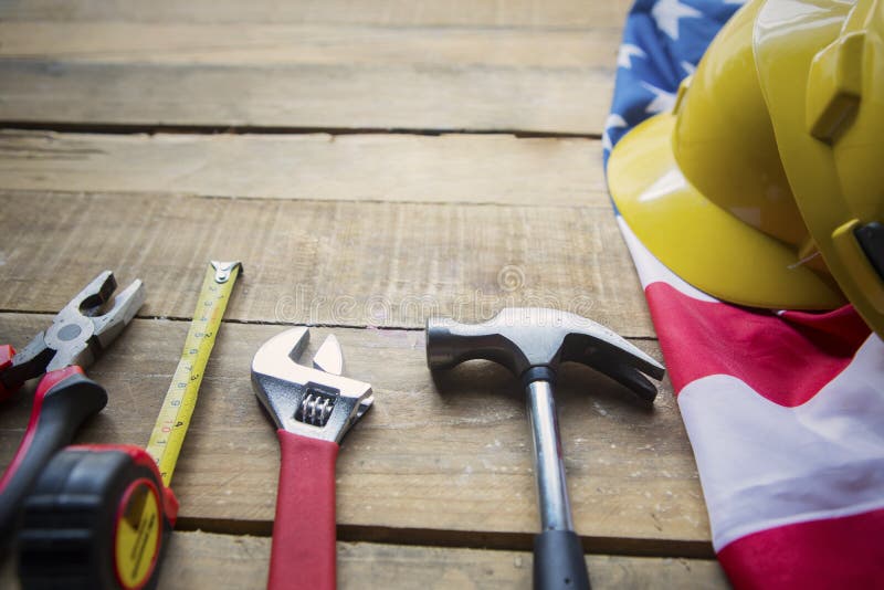 Construction Tools on the Table with American Flag Stock Image - Image ...