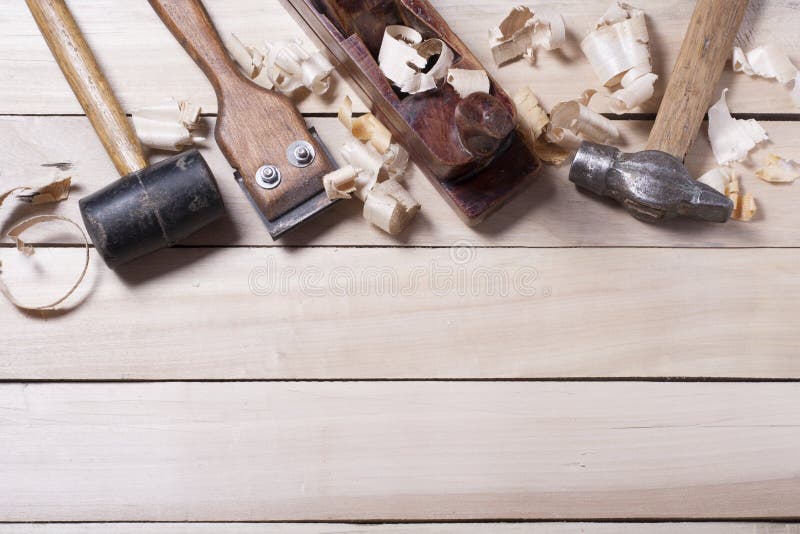 Construction Tools on Wooden Table with Sawdust. Joiner Carpenter ...