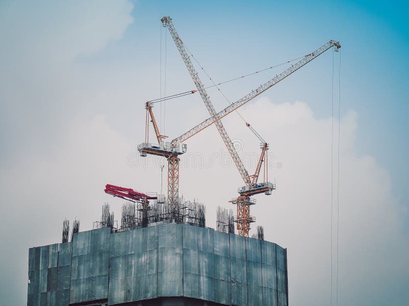 Construction Tower Canes Over Construction Site Stock Image - Image of ...
