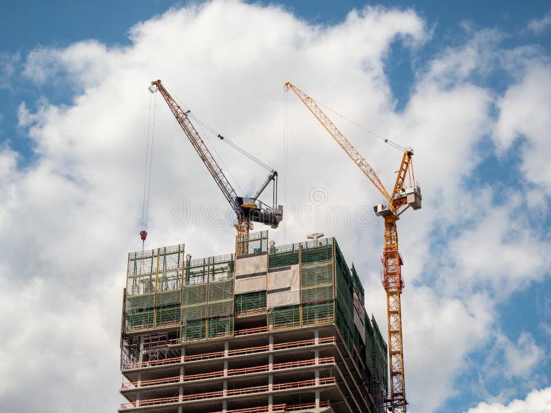 Construction. Tower Crane at the Construction Site of a High-rise ...