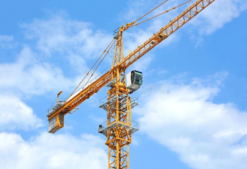Construction Tower Crane with Worker in Top Showing Height of the Crane ...