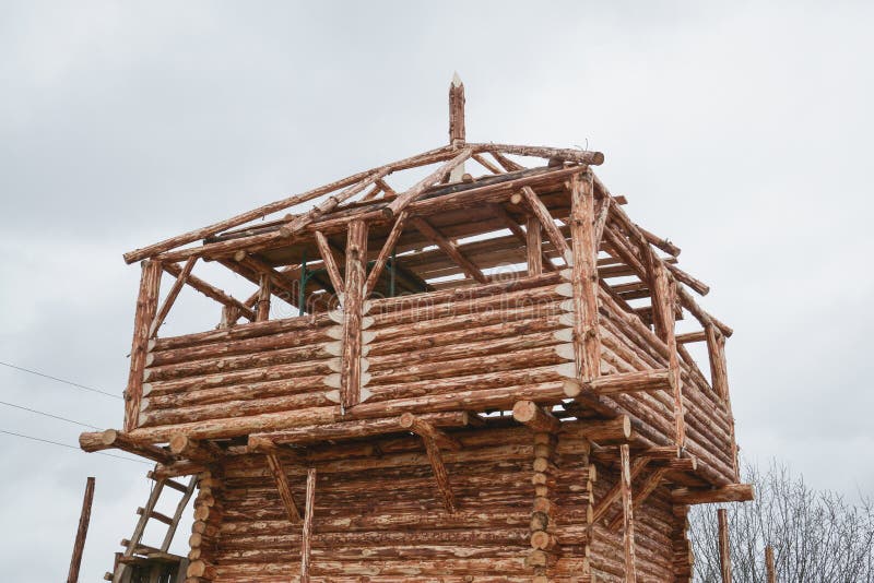 Construction of a Tower of Logs Stock Photo - Image of built, frame ...