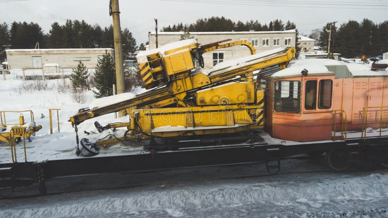 Construction Train with Yellow Machine with Locomotive Stock Image ...