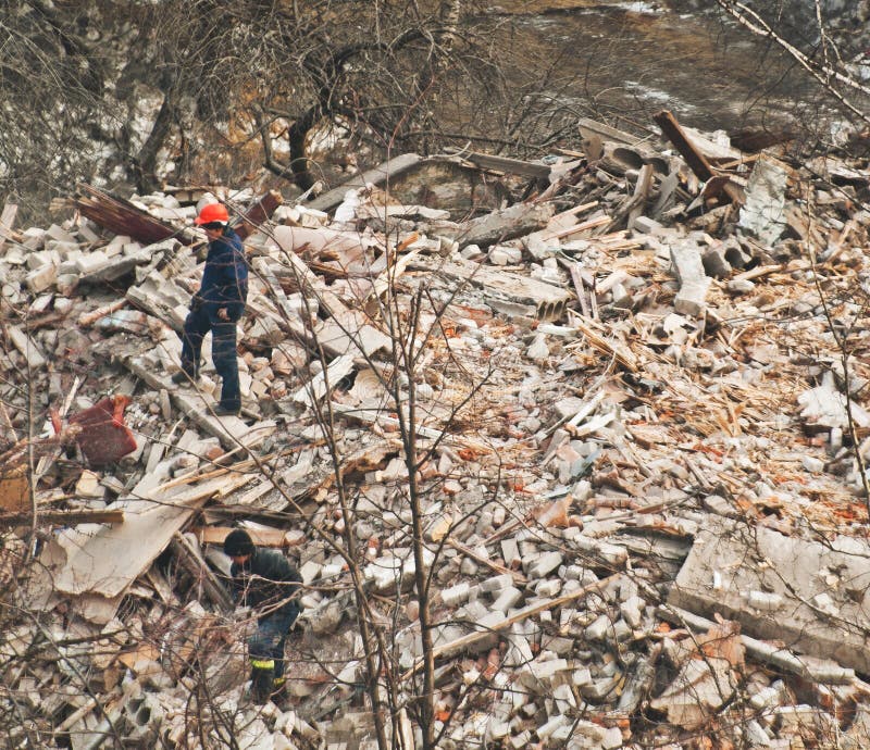 Demolition of a Brick Building with Excavator Mechanical Arm ...