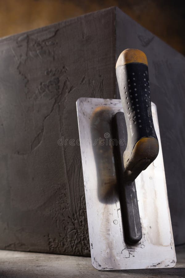 Construction Trowel Tool at Cement Background. Mason Tool on Concrete ...
