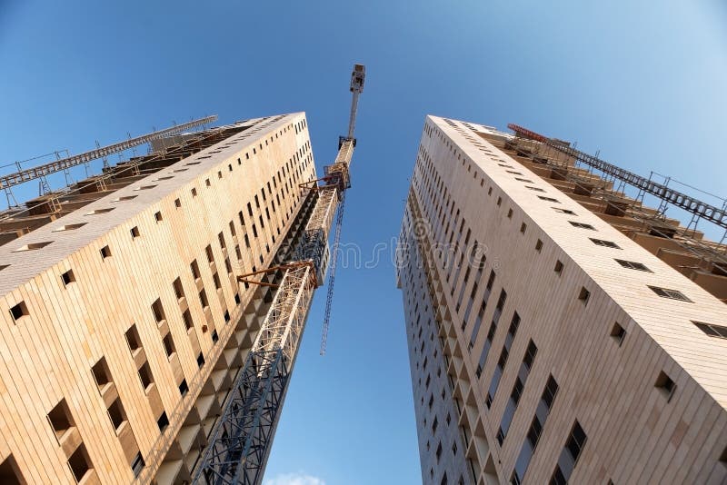 Construction of Two High-rise Buildings Stock Photo - Image of growth ...