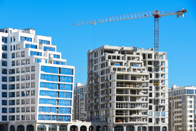 Construction of Two Identical Tall Buildings of White Blocks Against a ...