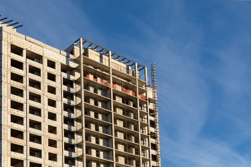 Construction of a Typical Multi-storey Building Against the Blue Sky ...