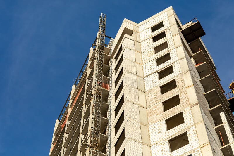 Construction of a Typical Multi-storey Building Against the Blue Sky ...