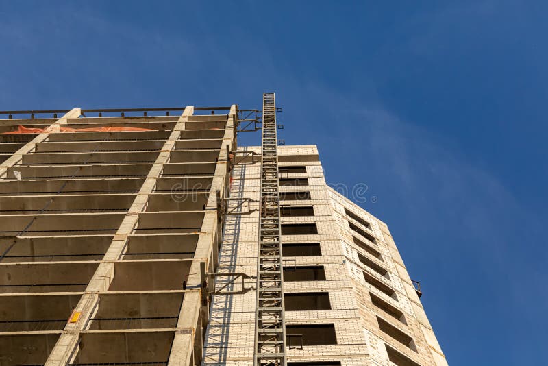 Construction of a Typical Multi-storey Building Against the Blue Sky ...