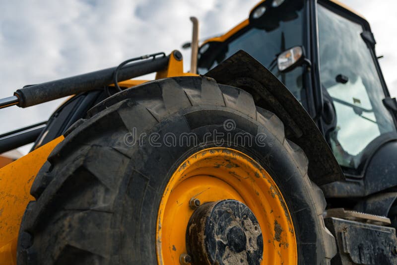 Construction Vehicle with Loader on Building Site Stock Photo - Image ...