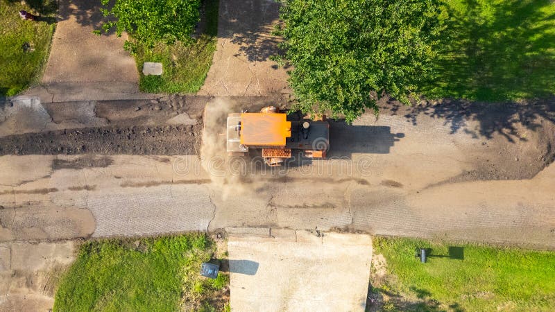 Construction Vehicle Preparing Road for New Layer of Asphalt Stock ...